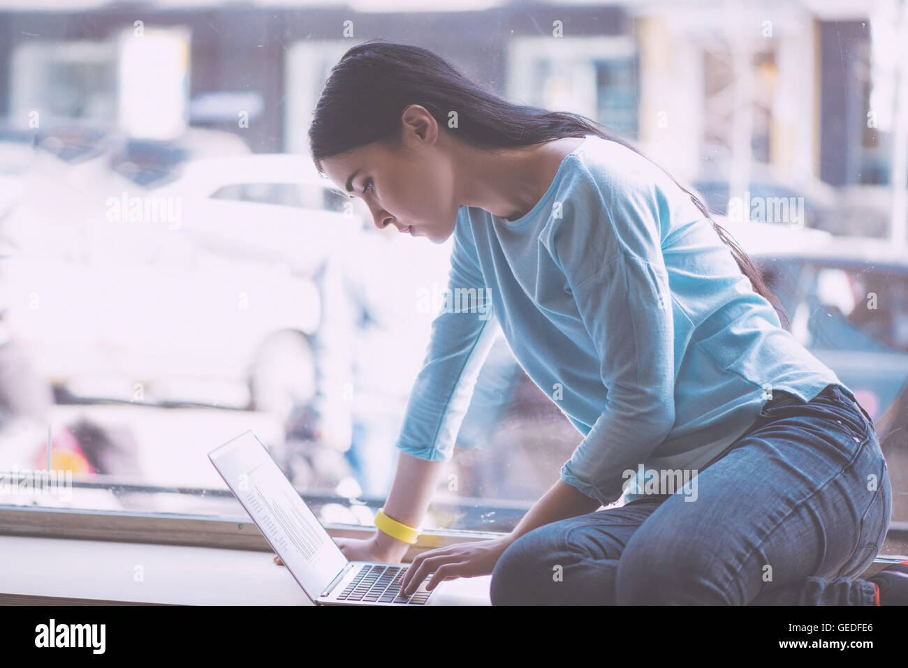 Young confident woman writing notes Stock Photo - Alamy