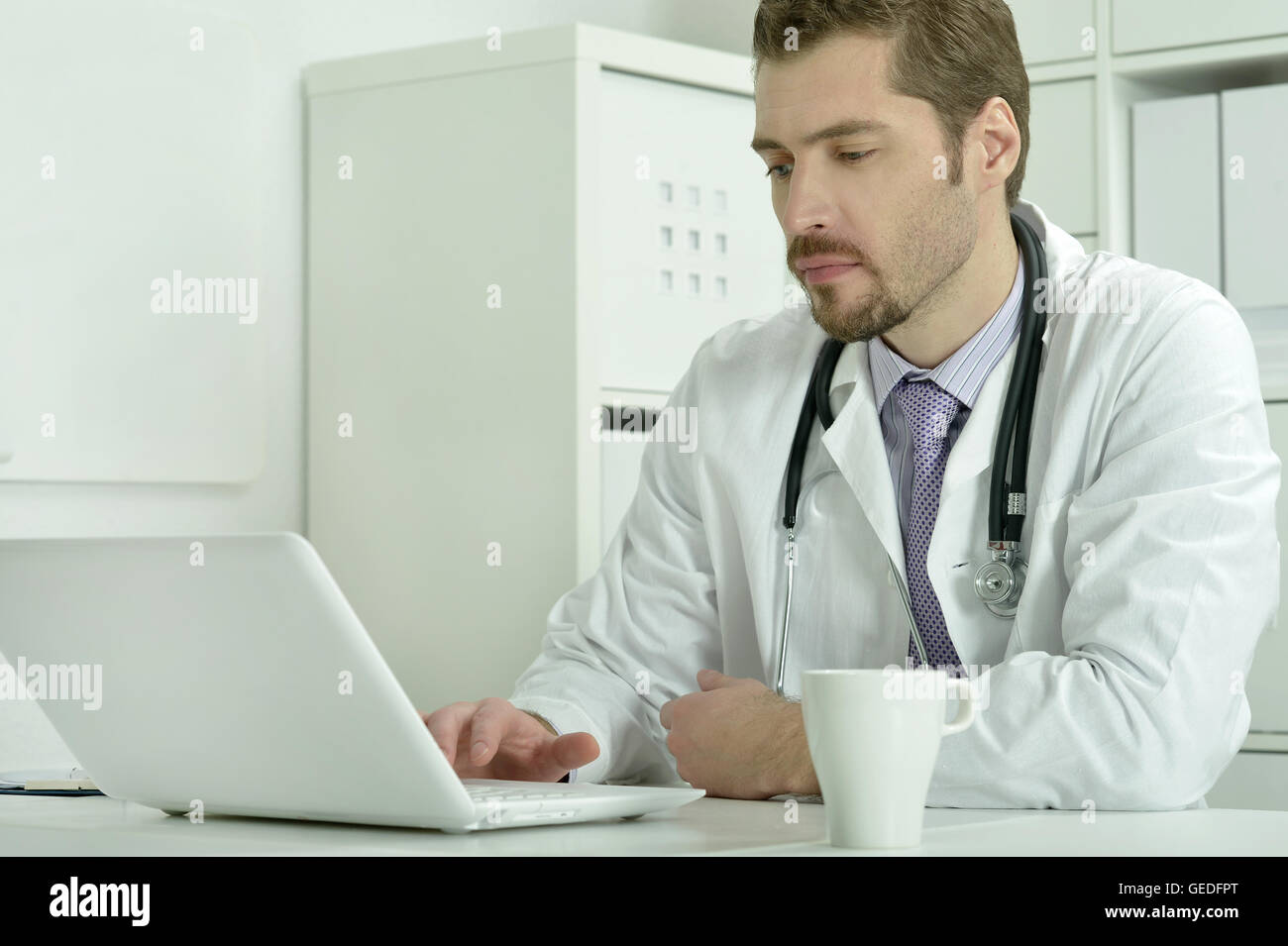 Busy receptionist hi-res stock photography and images - Alamy