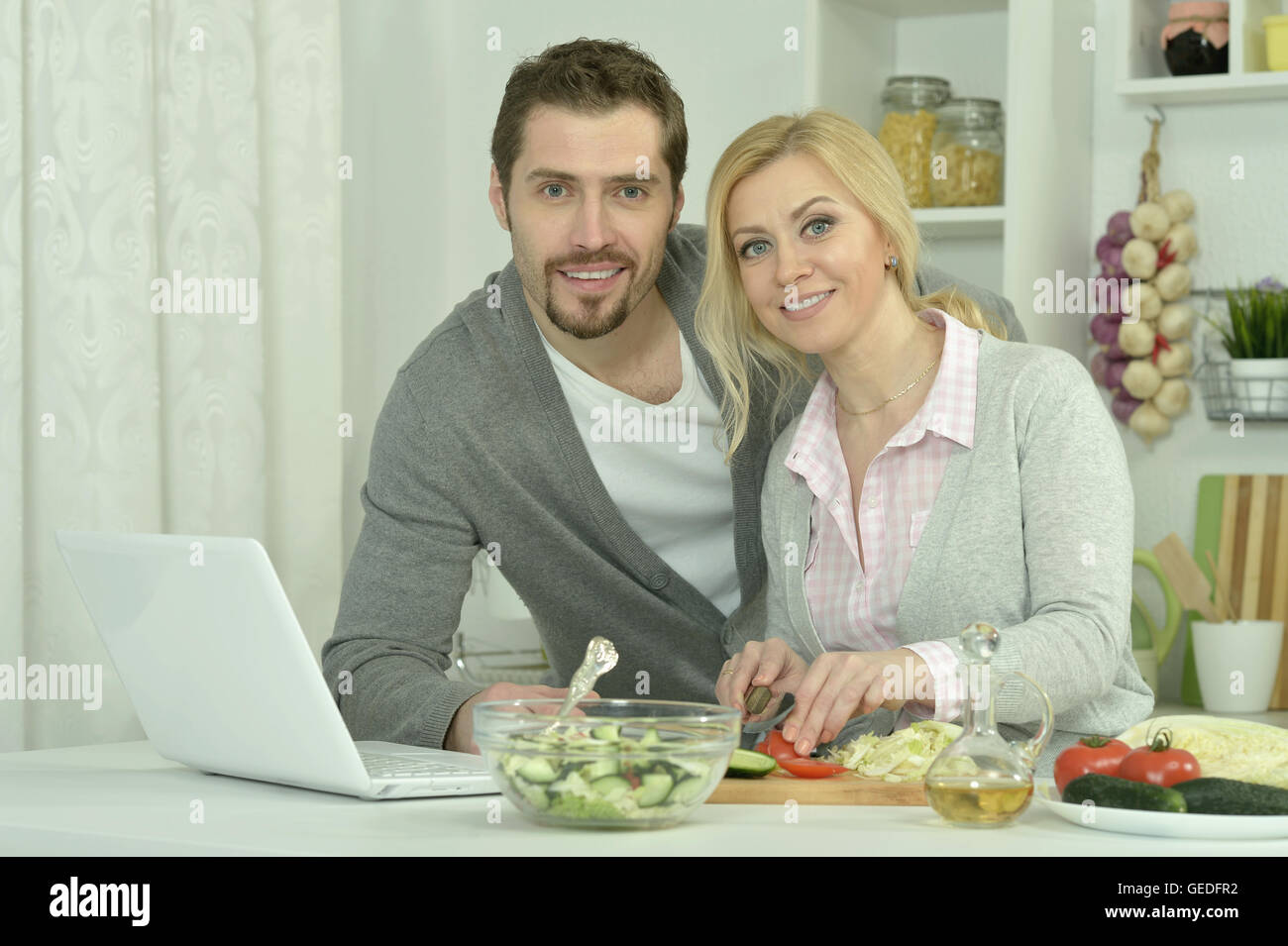 Boyfriend girlfriend cooking hi-res stock photography and images - Alamy