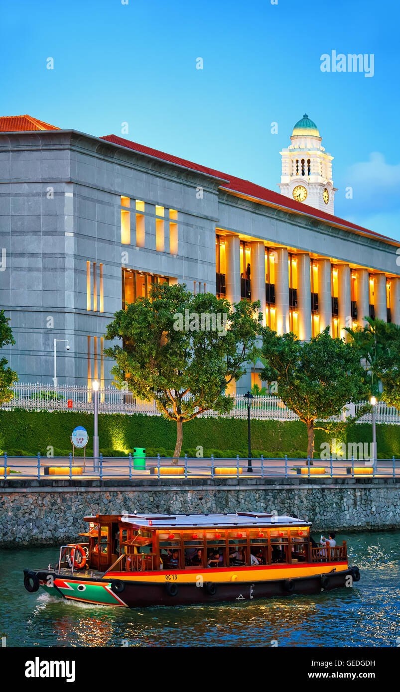 Singapore, Singapore - February 29, 2016: Ferry boat and Parliament ...