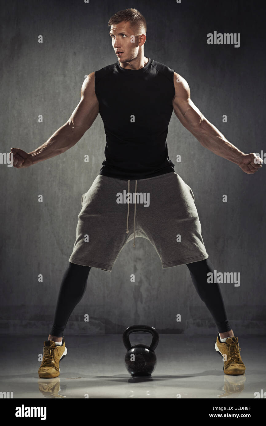 Portrait of a tough guy exercising hard Stock Photo - Alamy