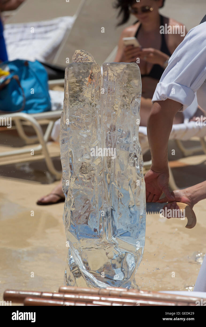 A member of the ships crew demonstrates ice carving on board Cunard's ...