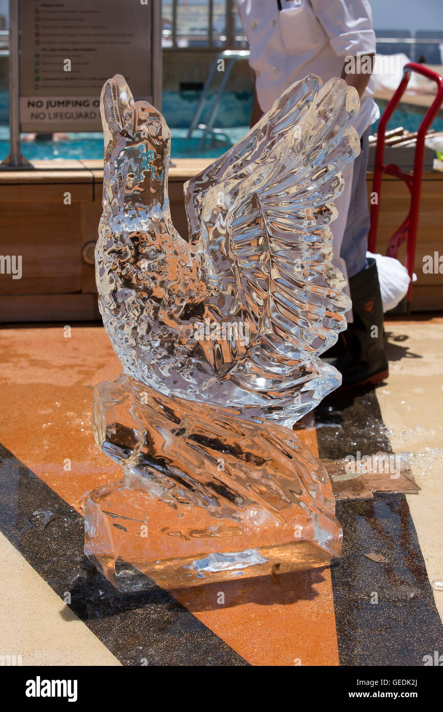 A member of the ships crew demonstrates ice carving on board Cunard's ...