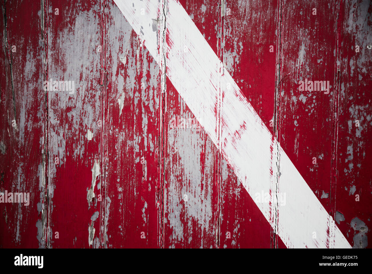 Weathered red door with white stripe in Menemsha Massachusetts on ...