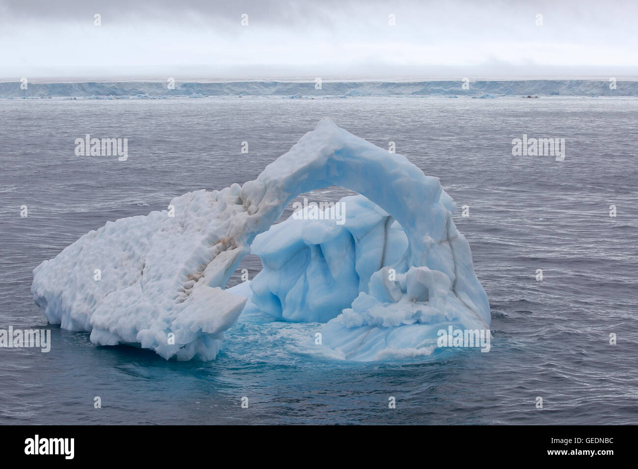 Small iceberg with an arch in front of Brasvellbreen glacier ...