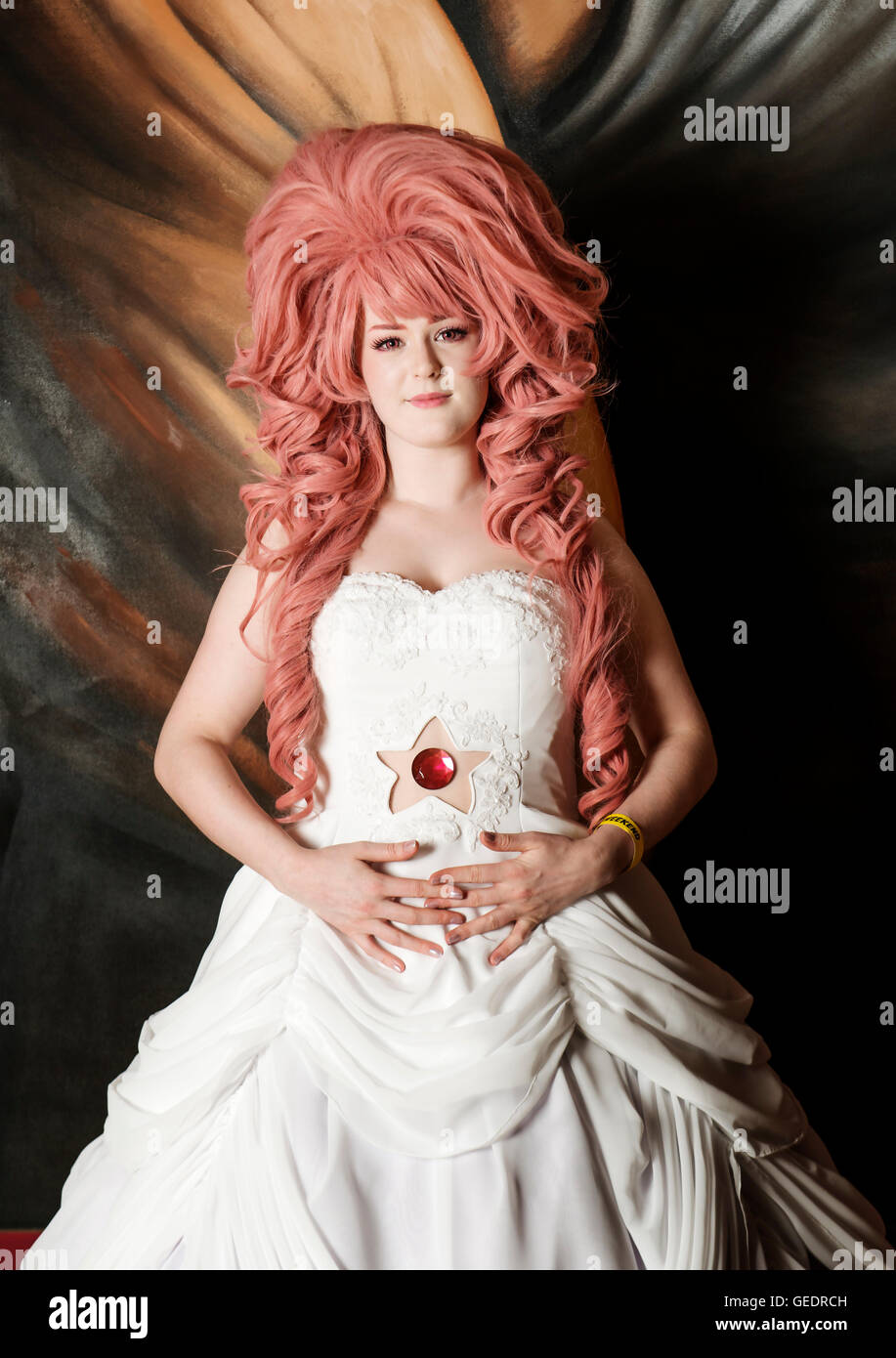 Cosplayers pose for photographs at a Comic Con convention Stock Photo ...
