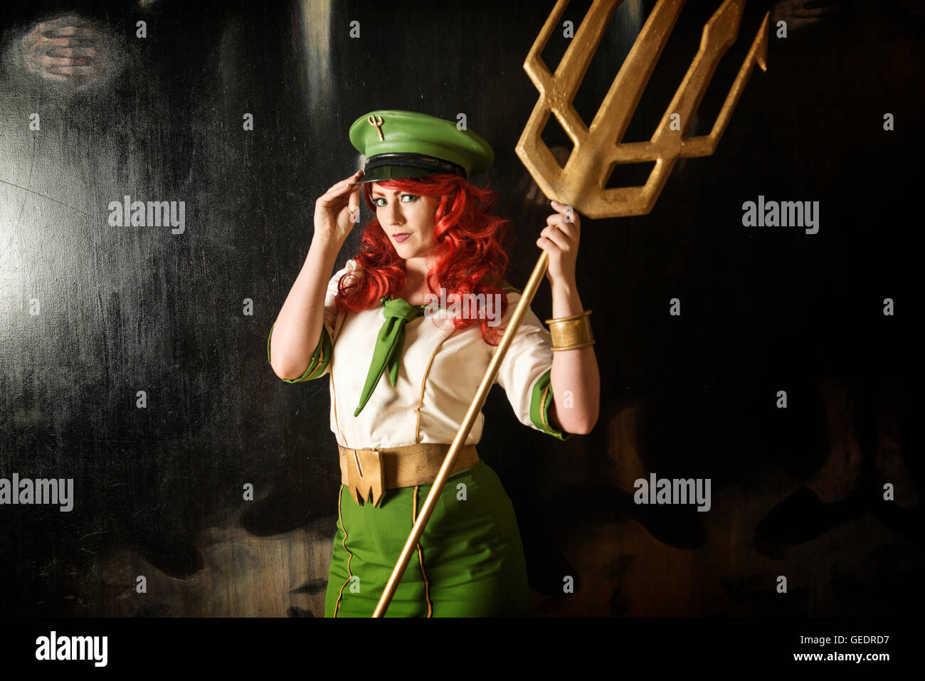 Cosplayers pose for photographs at a Comic Con convention Stock Photo ...