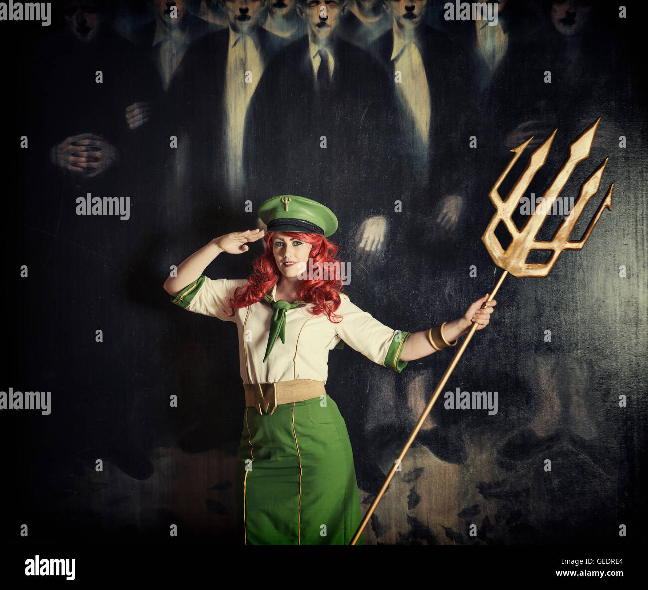 Cosplayer dressed as DC Comics character Mera ,poses for photographs at ...