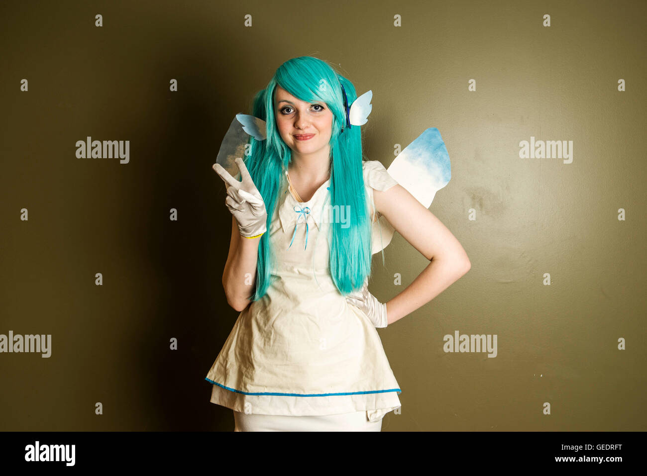 Female cosplayer pose for photographs at a Comic Con convention Stock ...