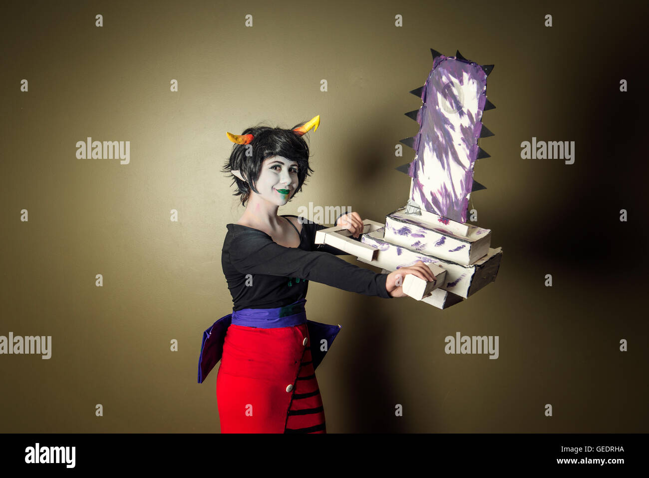 Cosplayer poses for photographs at a Comic Con convention Stock Photo ...