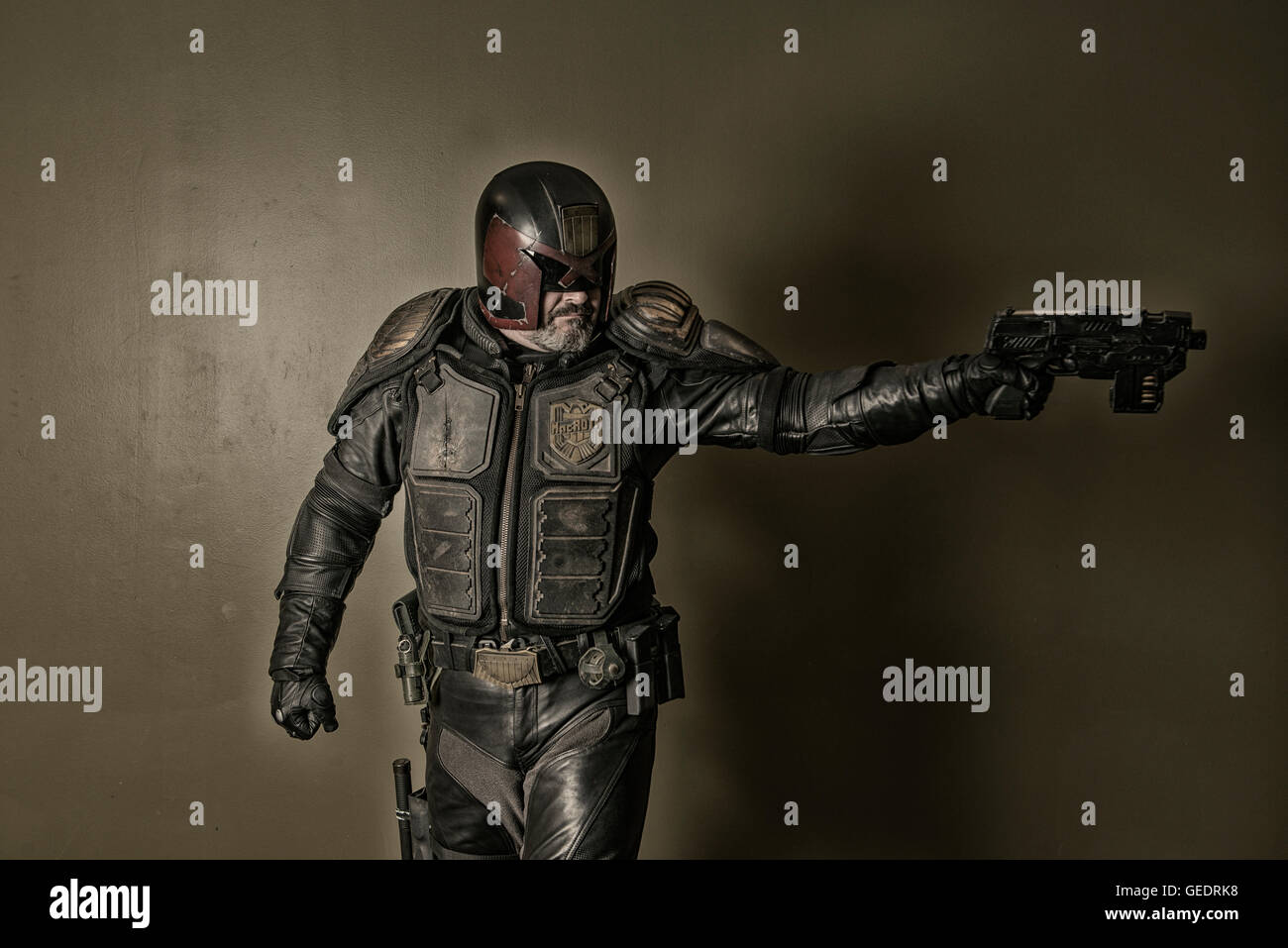 Cosplayer dressed as Judge Dredd poses for photograph at a Comic Con ...