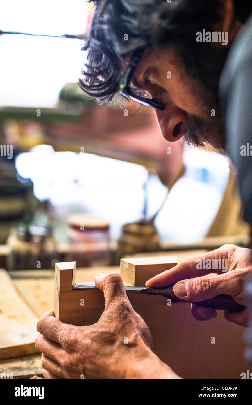 Male using wood chisel hi-res stock photography and images - Alamy