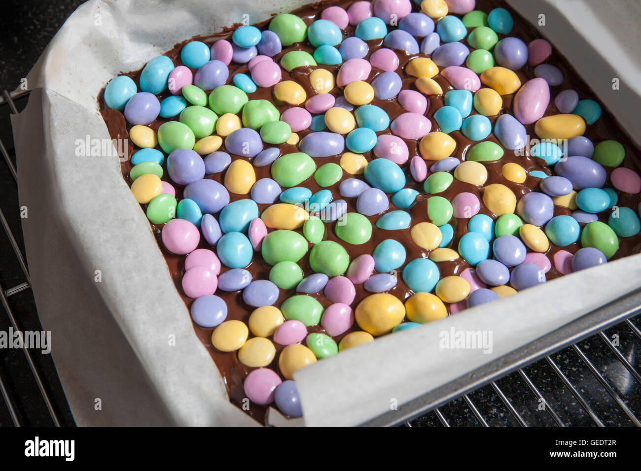 Pastel Candies in Chocolate Stock Photo - Alamy