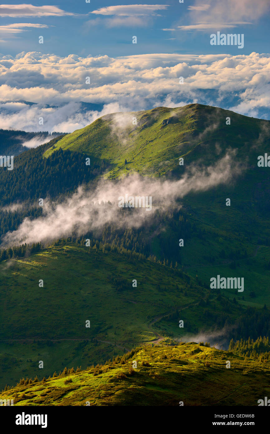 Dramatic sky fog mountains hi-res stock photography and images - Alamy