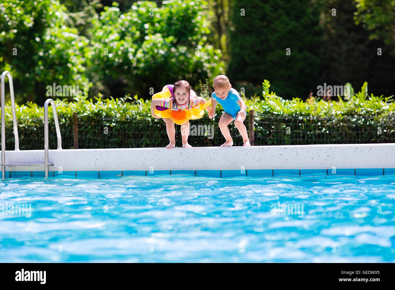 Kids laughing swim hi-res stock photography and images - Alamy