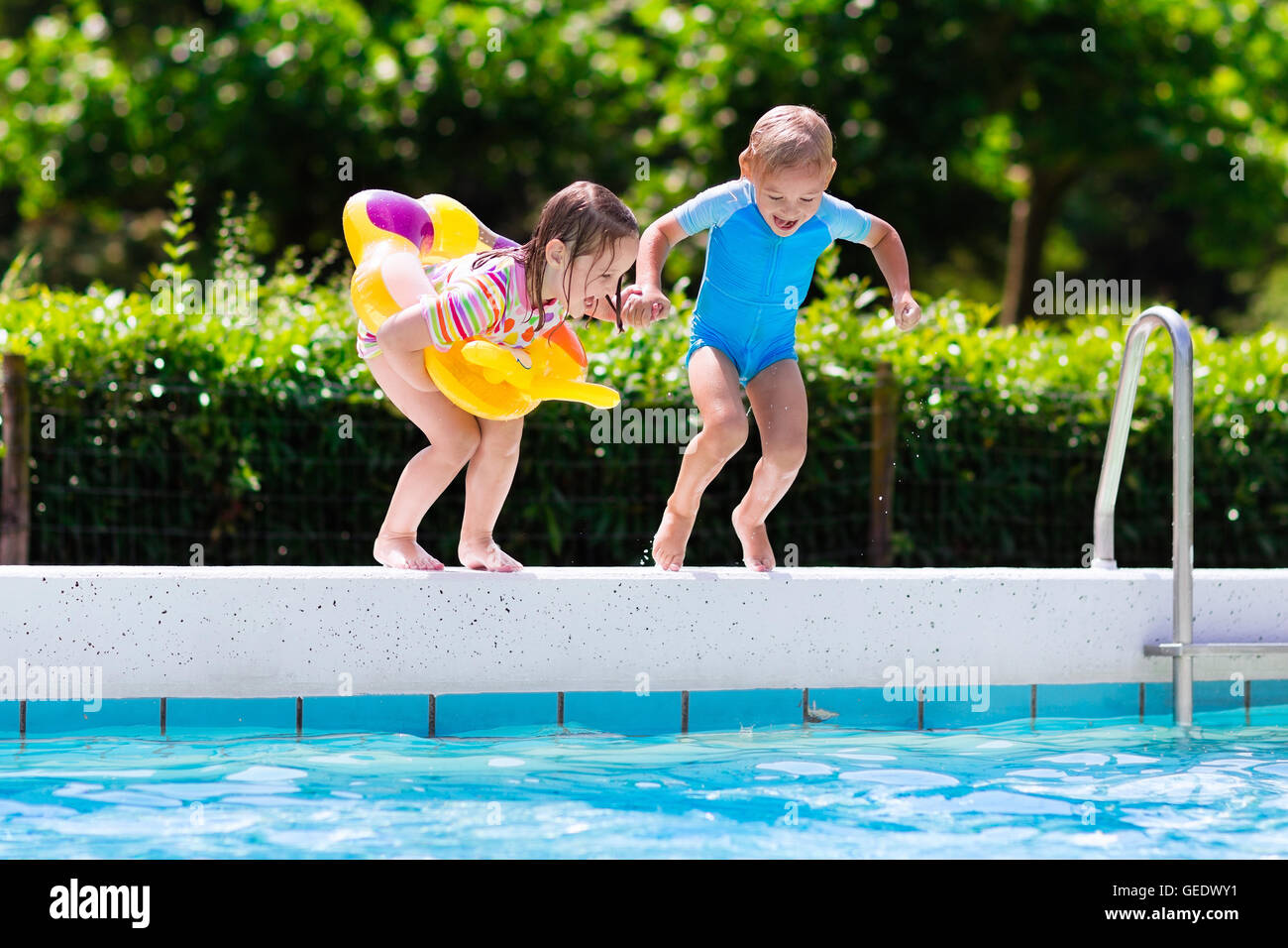 Kids Jumping Pool Summer Friends High Resolution Stock Photography and ...