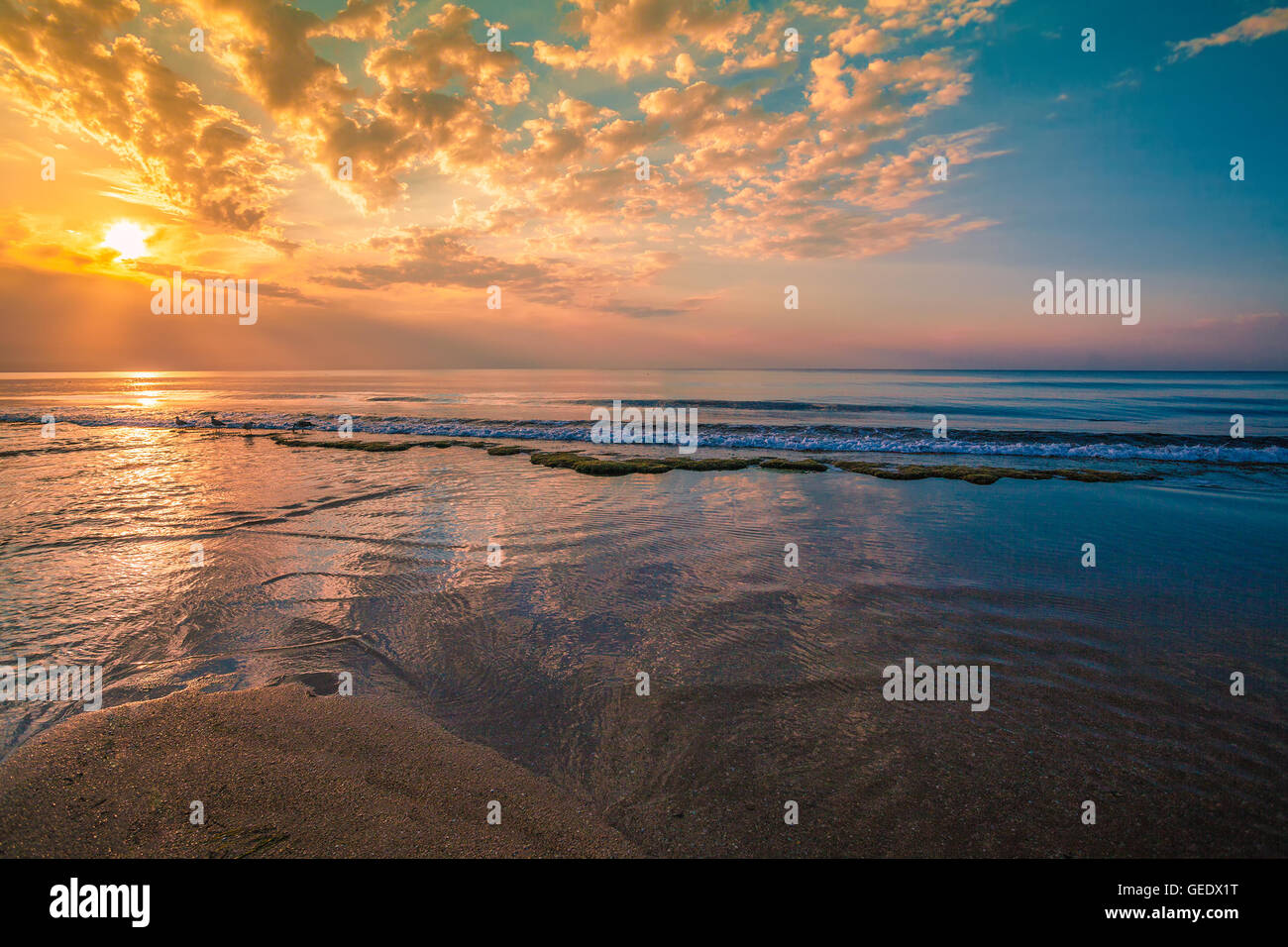 Magical sunset sea green island hi-res stock photography and images - Alamy