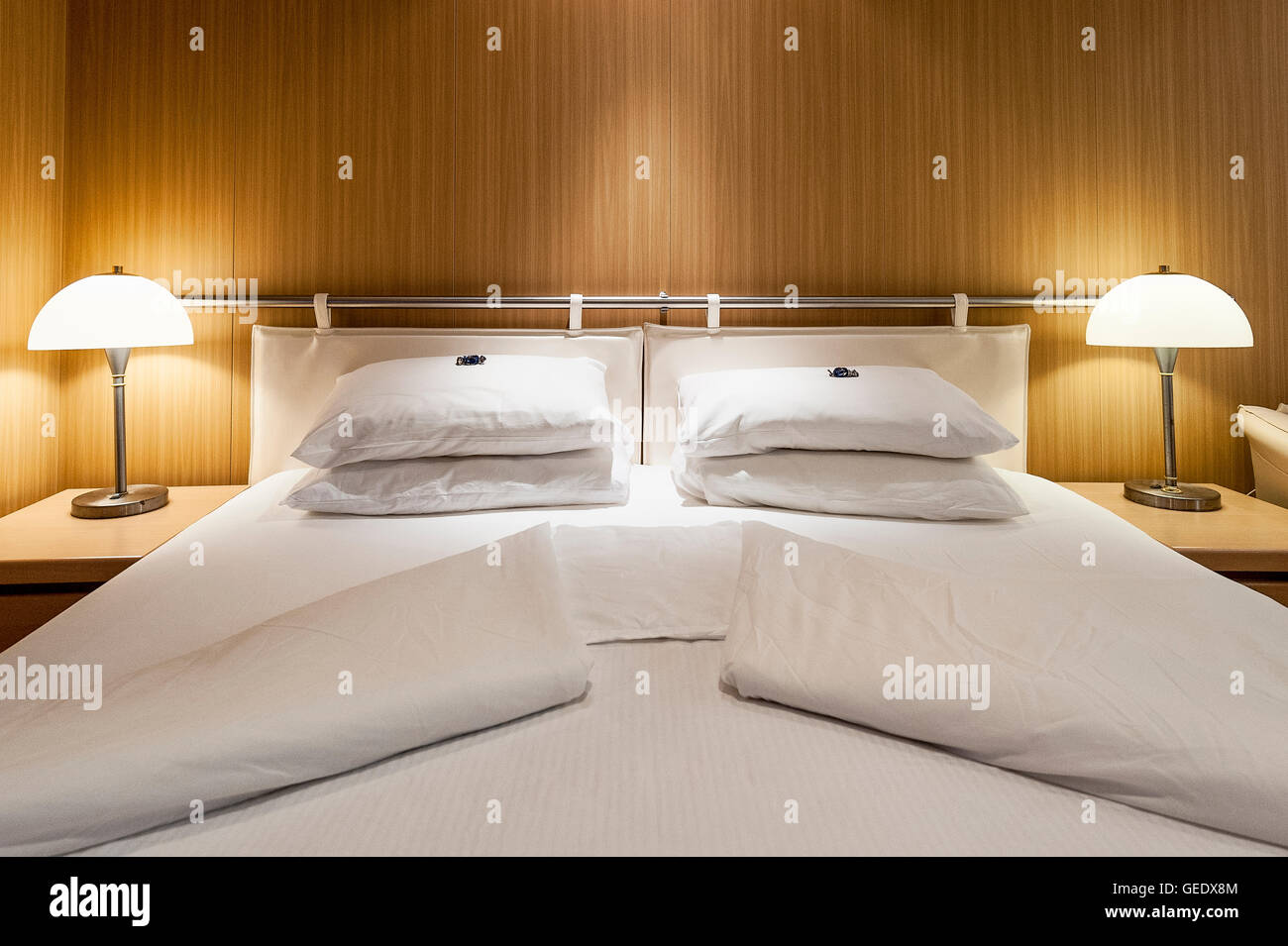 Freshly turned bed of a hotel room Stock Photo - Alamy
