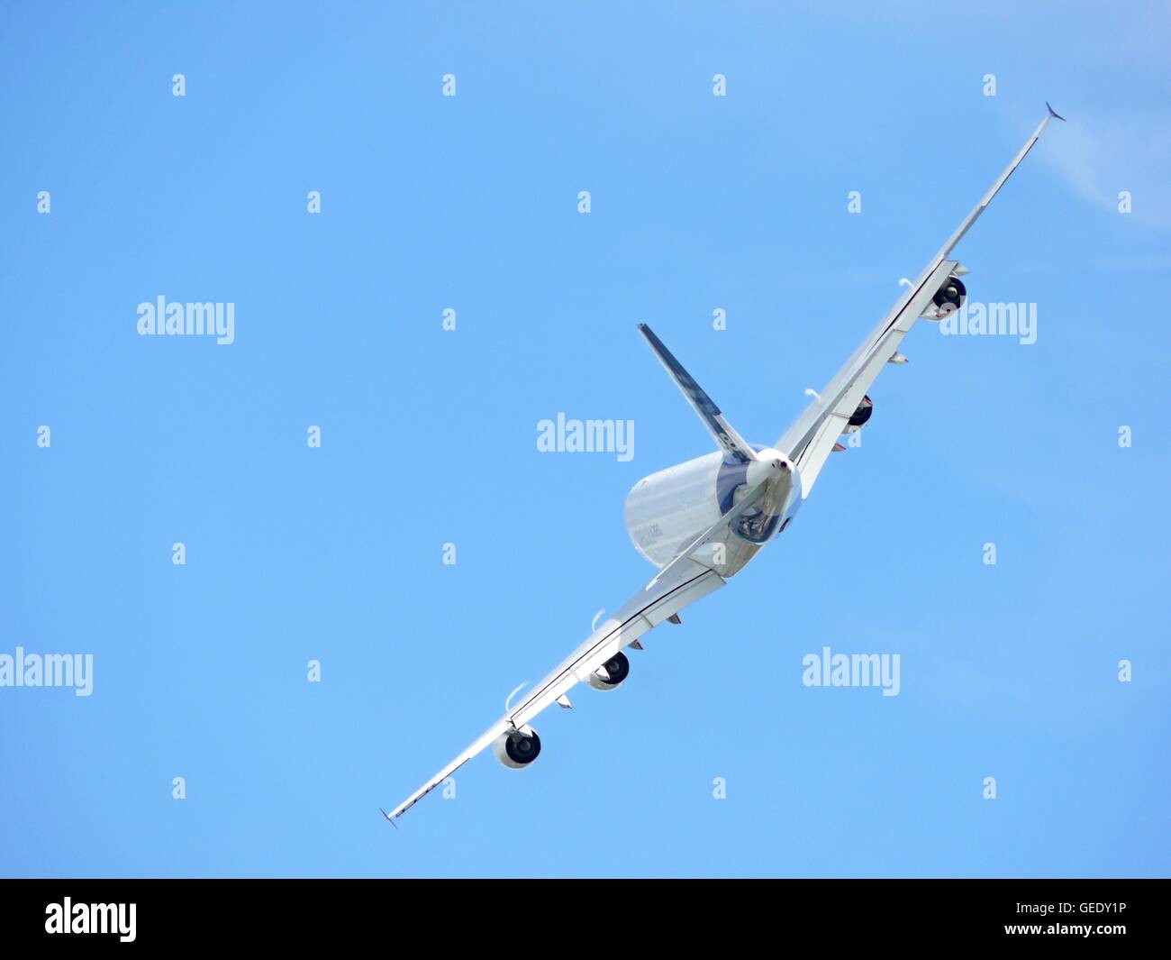 Airbus in clear sky Stock Photo - Alamy