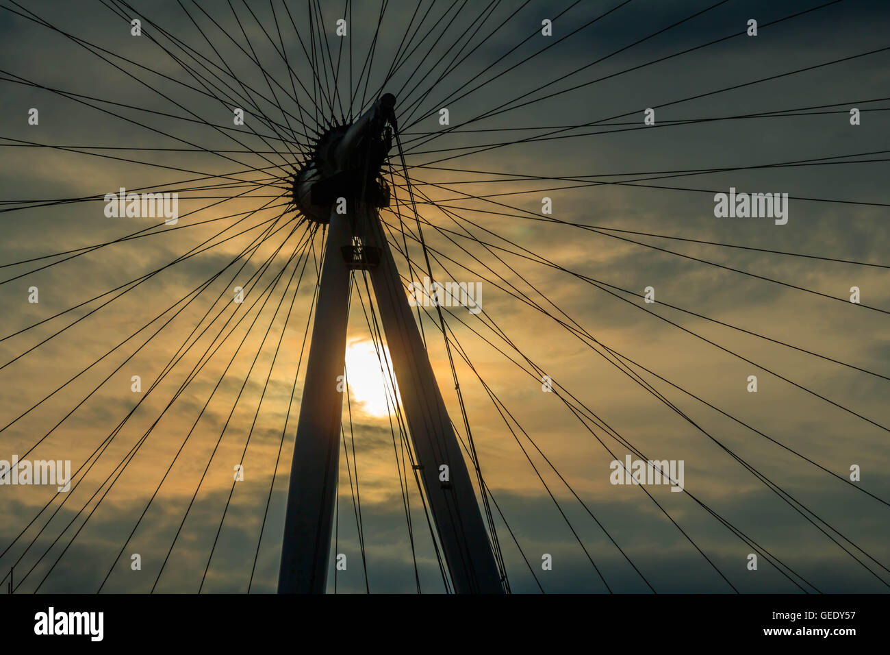 Part of the structure of the London eye taken during dusk with the sun ...