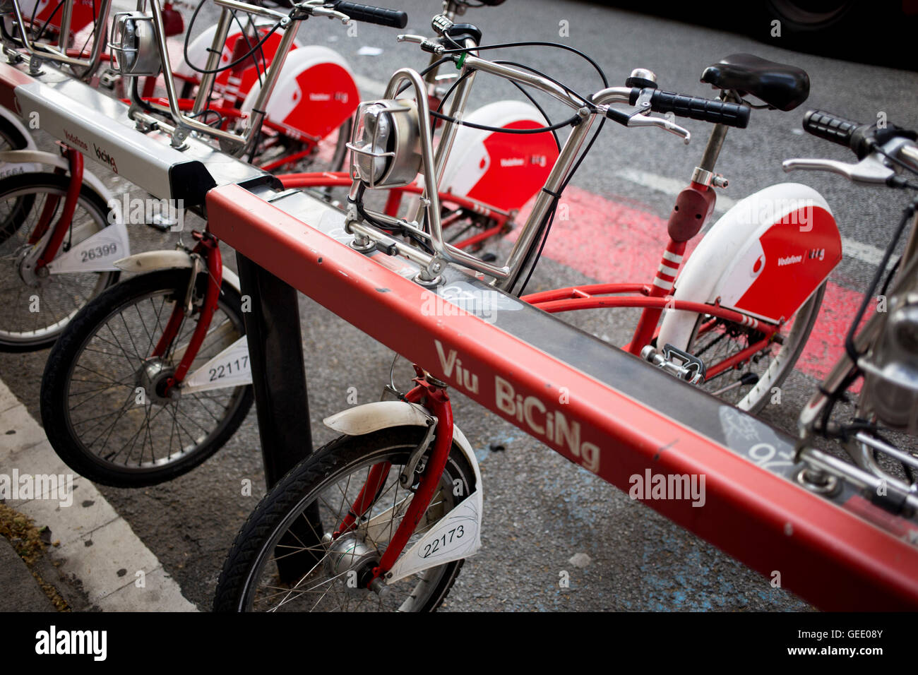 Row of red hire bicycles in Barcelona Stock Photo - Alamy