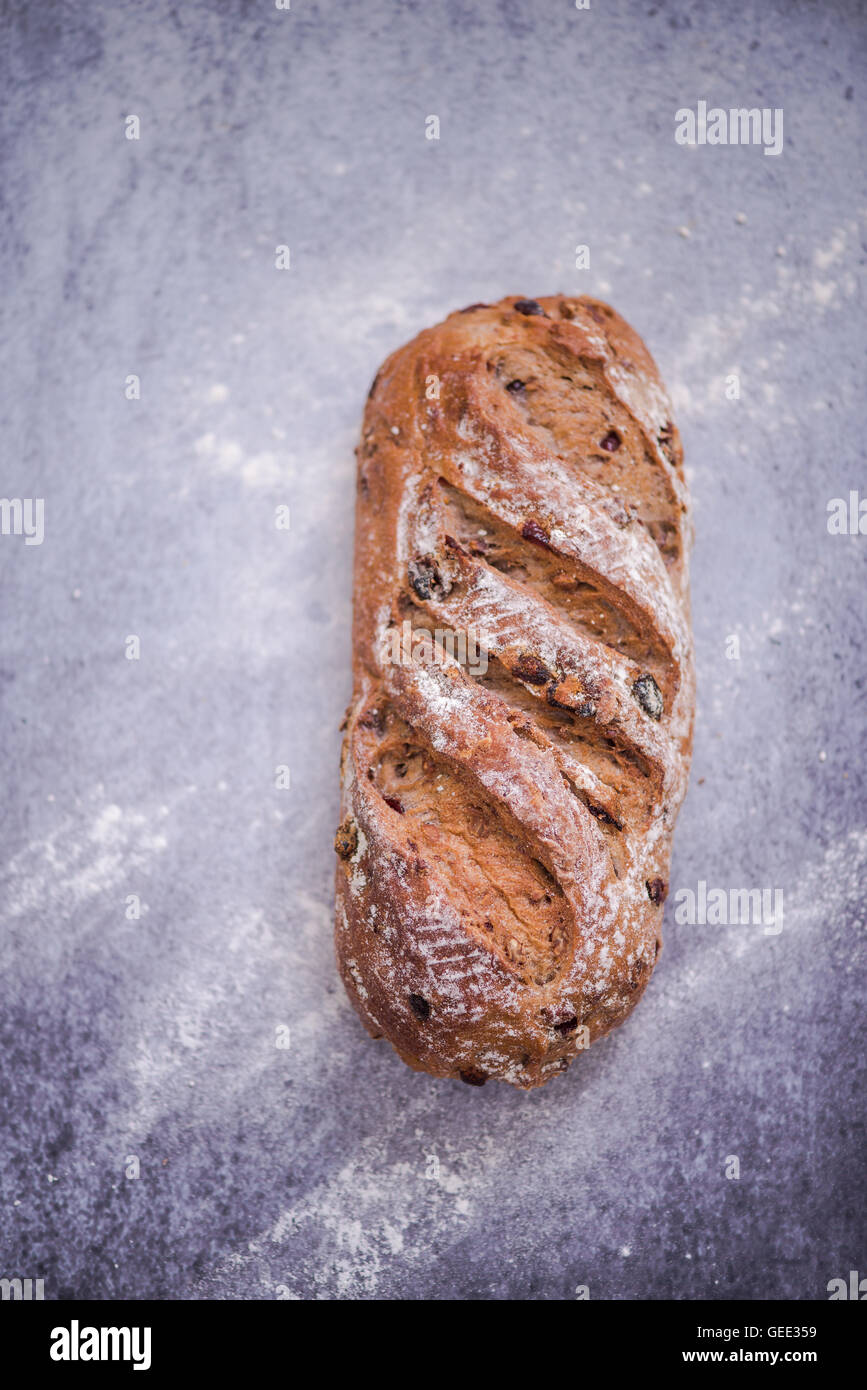 wholegrain healthy bread loaf, on bakery table Stock Photo - Alamy