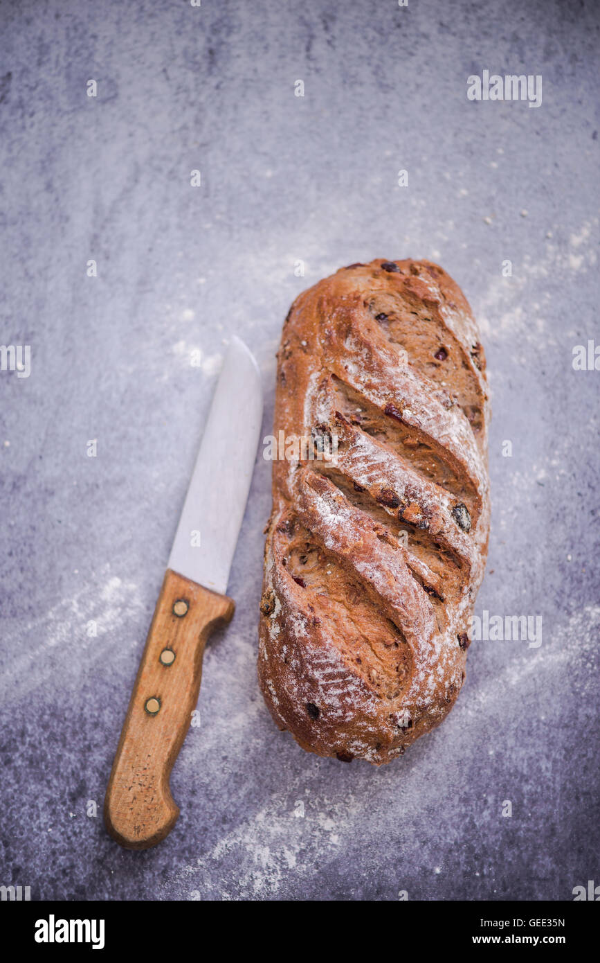 wholegrain healthy bread loaf, on bakery table Stock Photo - Alamy