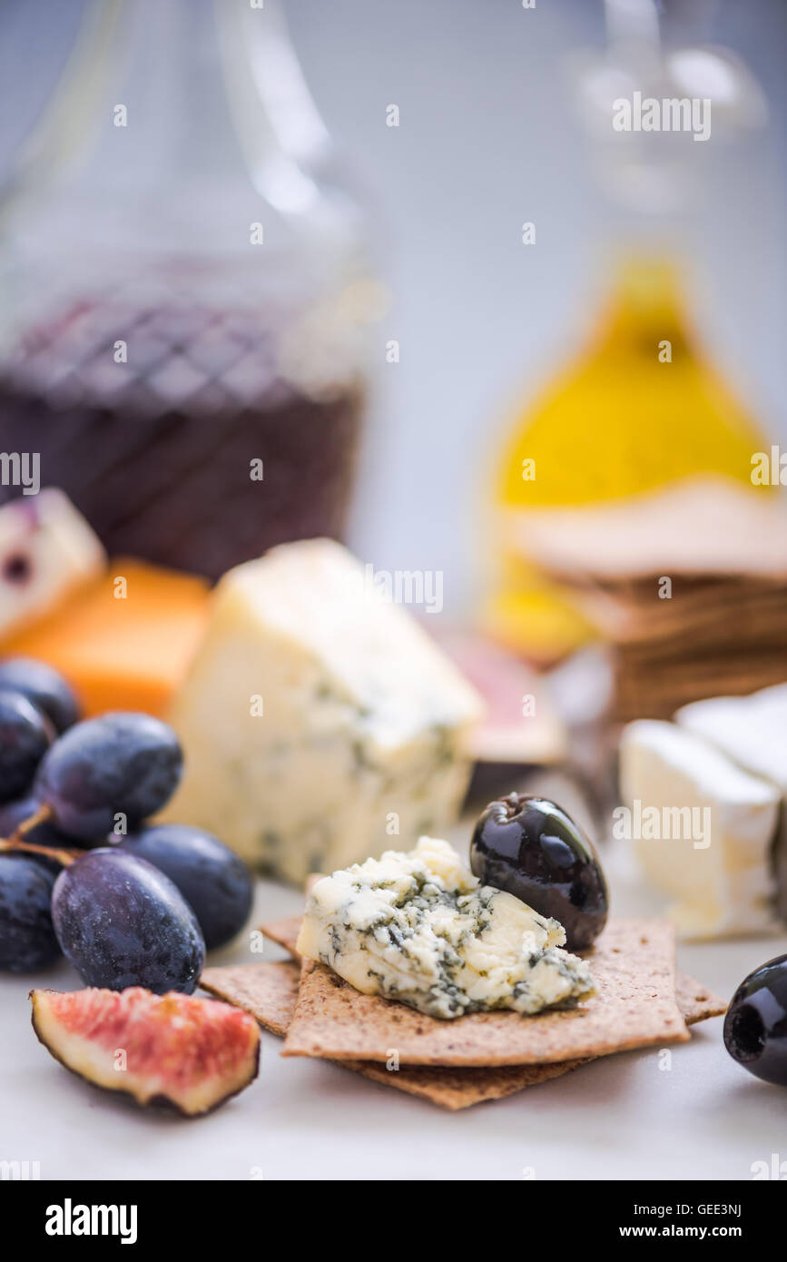italian cheese selection with olives,grapes and fig Stock Photo - Alamy