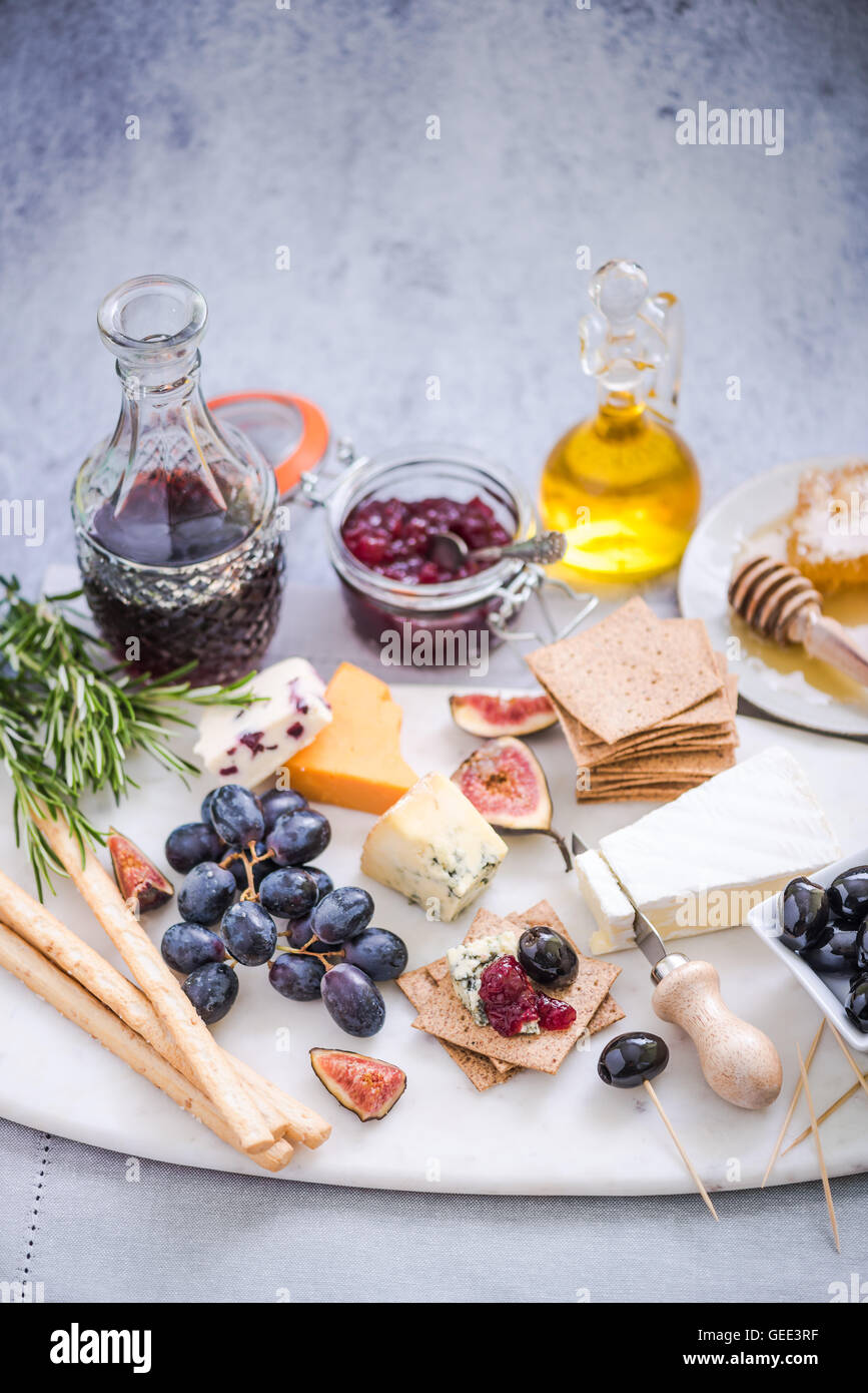 italian cheese selection with olives,grapes and fig Stock Photo - Alamy