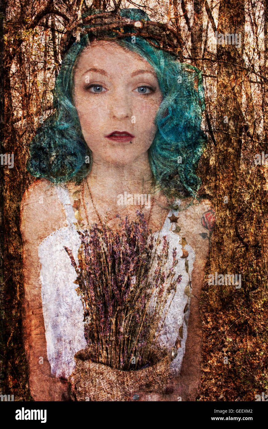 Beautiful young woman wearing twig crown holding a bouquet of lavender ...