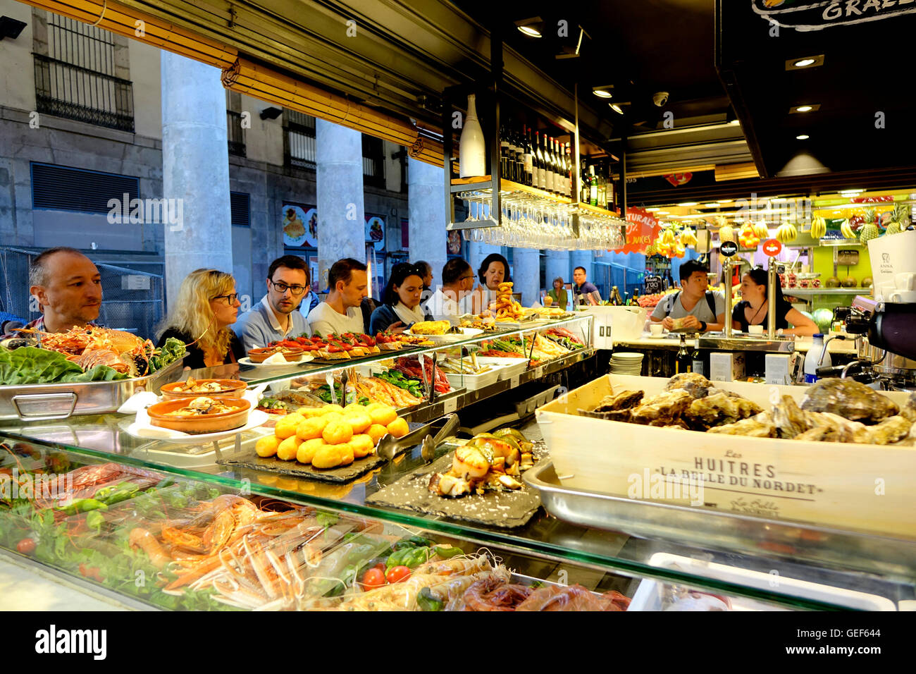 A breakfast and lunch counter with a variety of food items to select ...