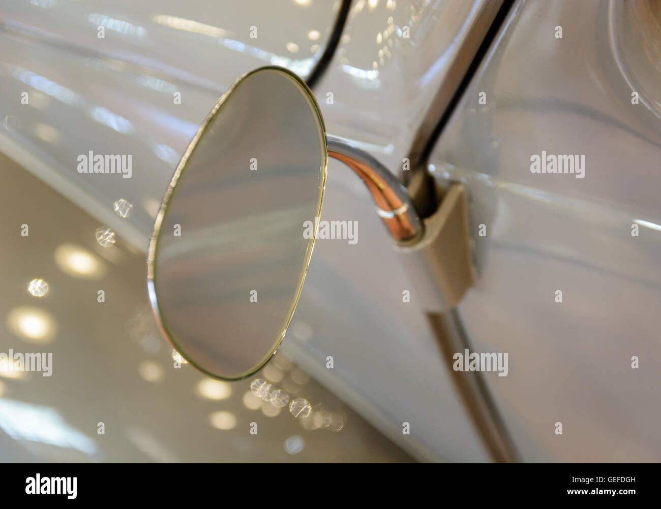 Mirror on an old classic car Stock Photo - Alamy