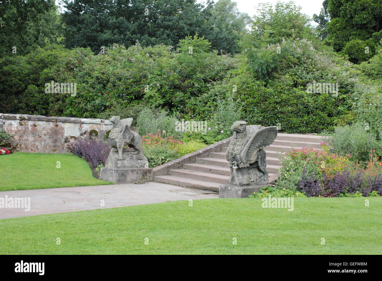 Griffin guarding the stone steps at Coombe Abbey Stock Photo - Alamy