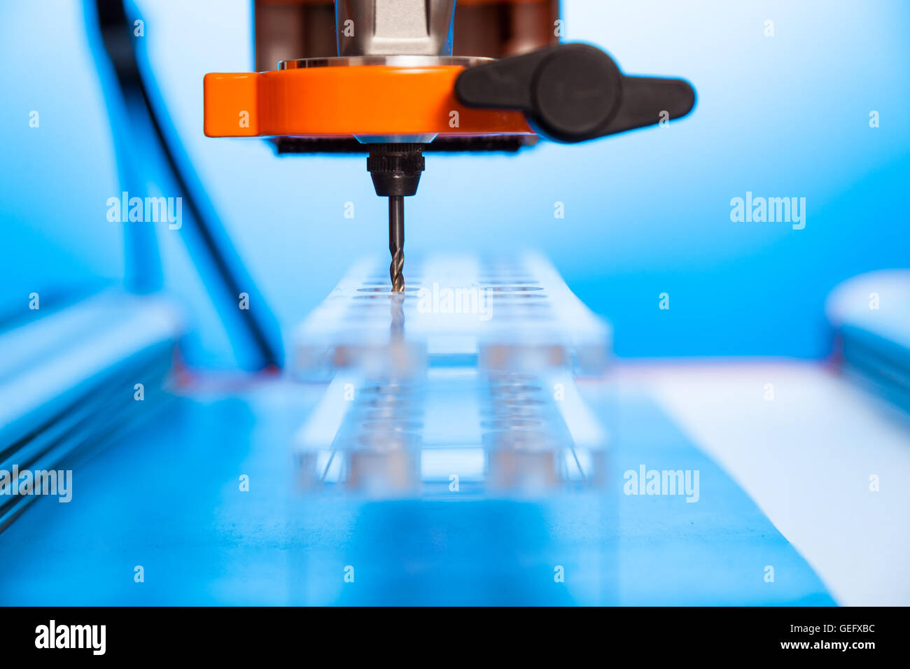 Cutter CNC router and plastic parts of Plexiglas Stock Photo - Alamy