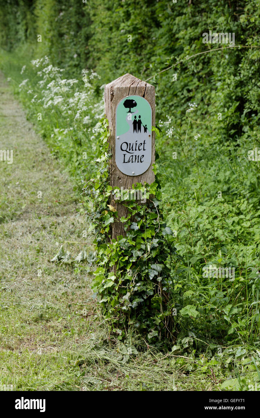Road side sign showing a country lane is part of the quiet lane scheme ...