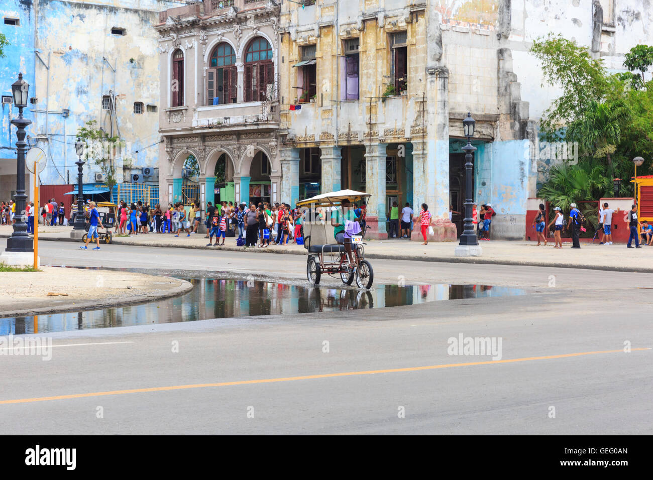 Bicitaxi in street scene in the Centro District, people waiting for ...