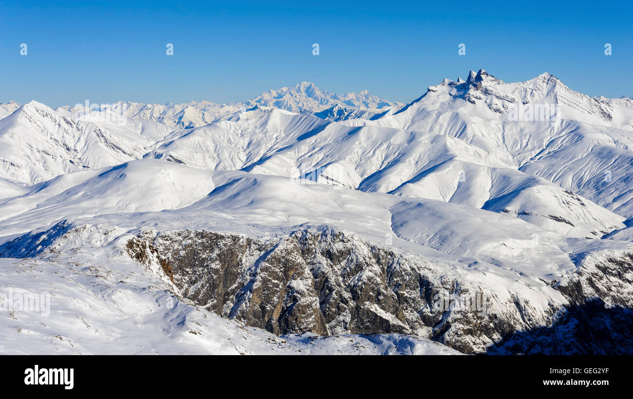 Mont Blanc and other snowy peaks in the French alps during winter by a ...