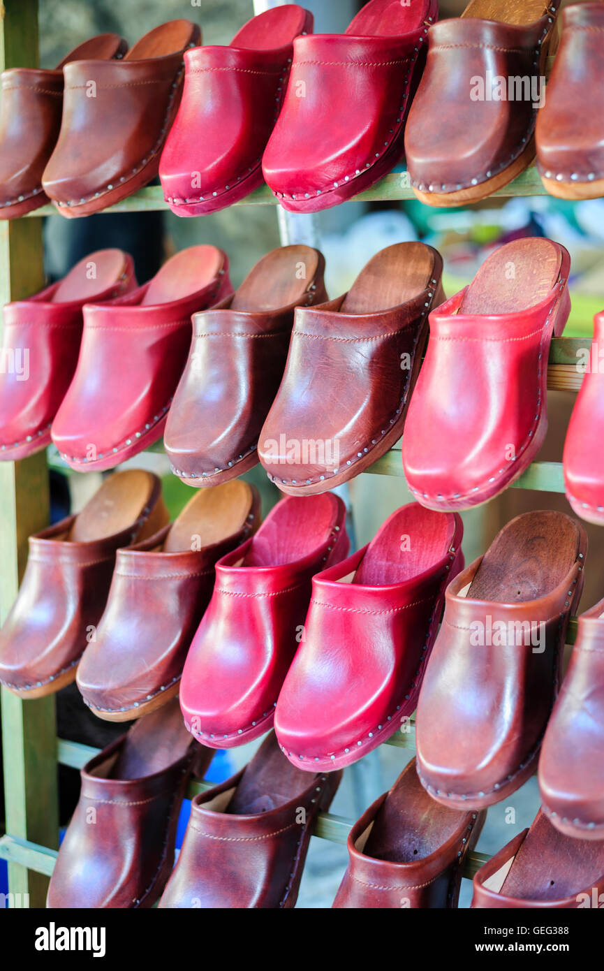 Traditional Clogs handmade in the French Alps, in leather, displayed in ...