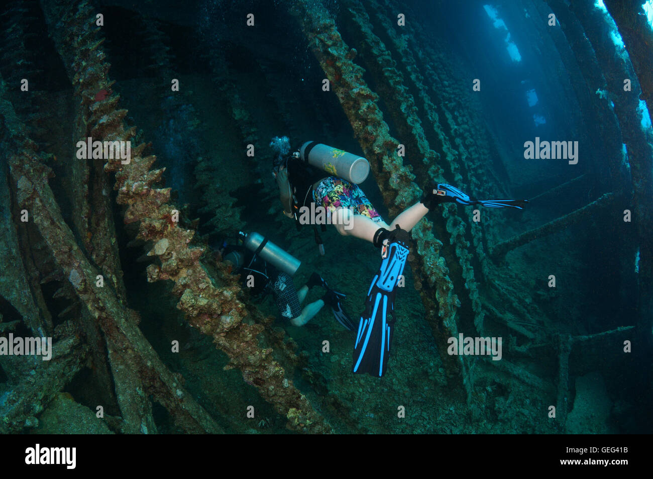 Two male scuba diver inside the wreck of the SS Carnatic, Red Sea ...