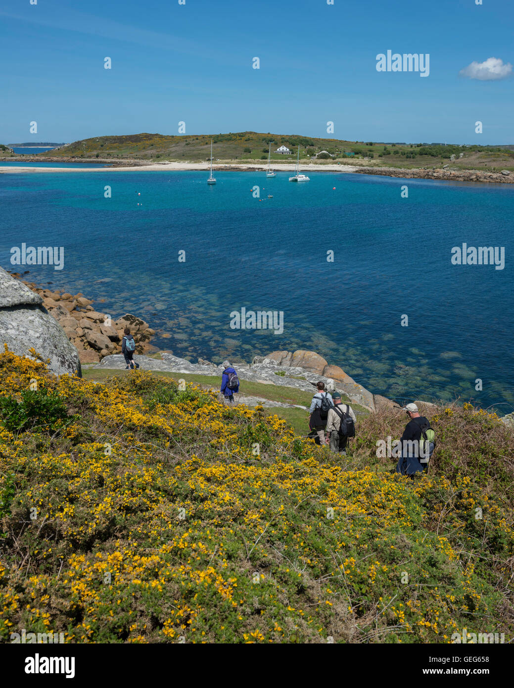 Hikers on St Agnes, Isles of Scilly. Cornwall. England. UK Stock Photo ...