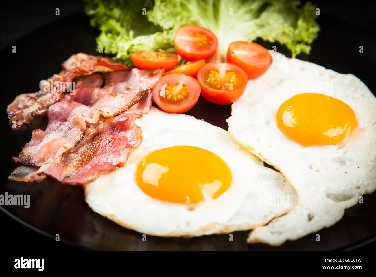 Traditional breakfast on a plate Stock Photo - Alamy