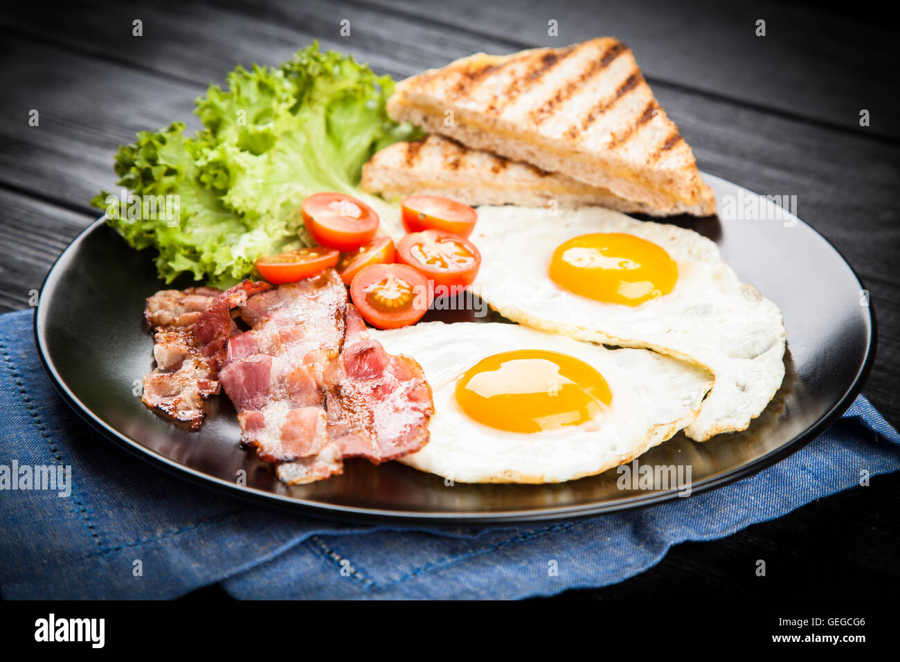 Traditional breakfast on a plate Stock Photo - Alamy
