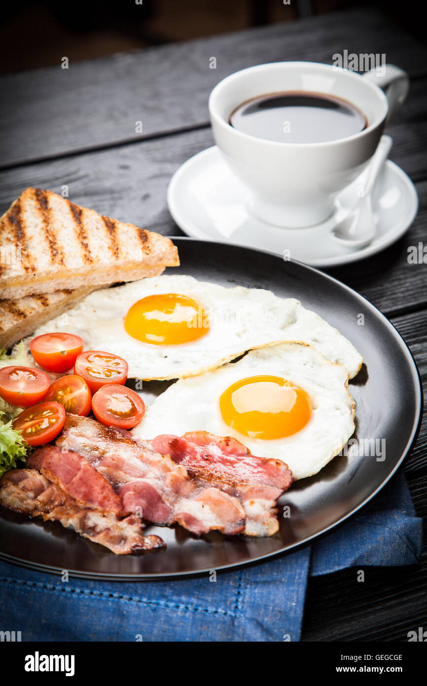 Traditional breakfast on a plate Stock Photo - Alamy