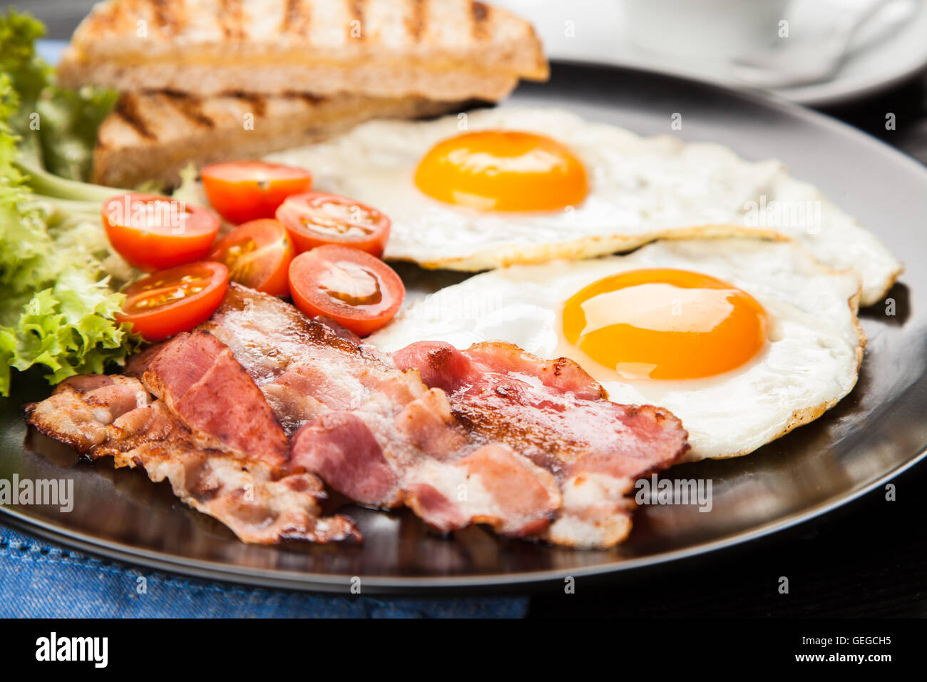 Traditional breakfast on a plate Stock Photo - Alamy