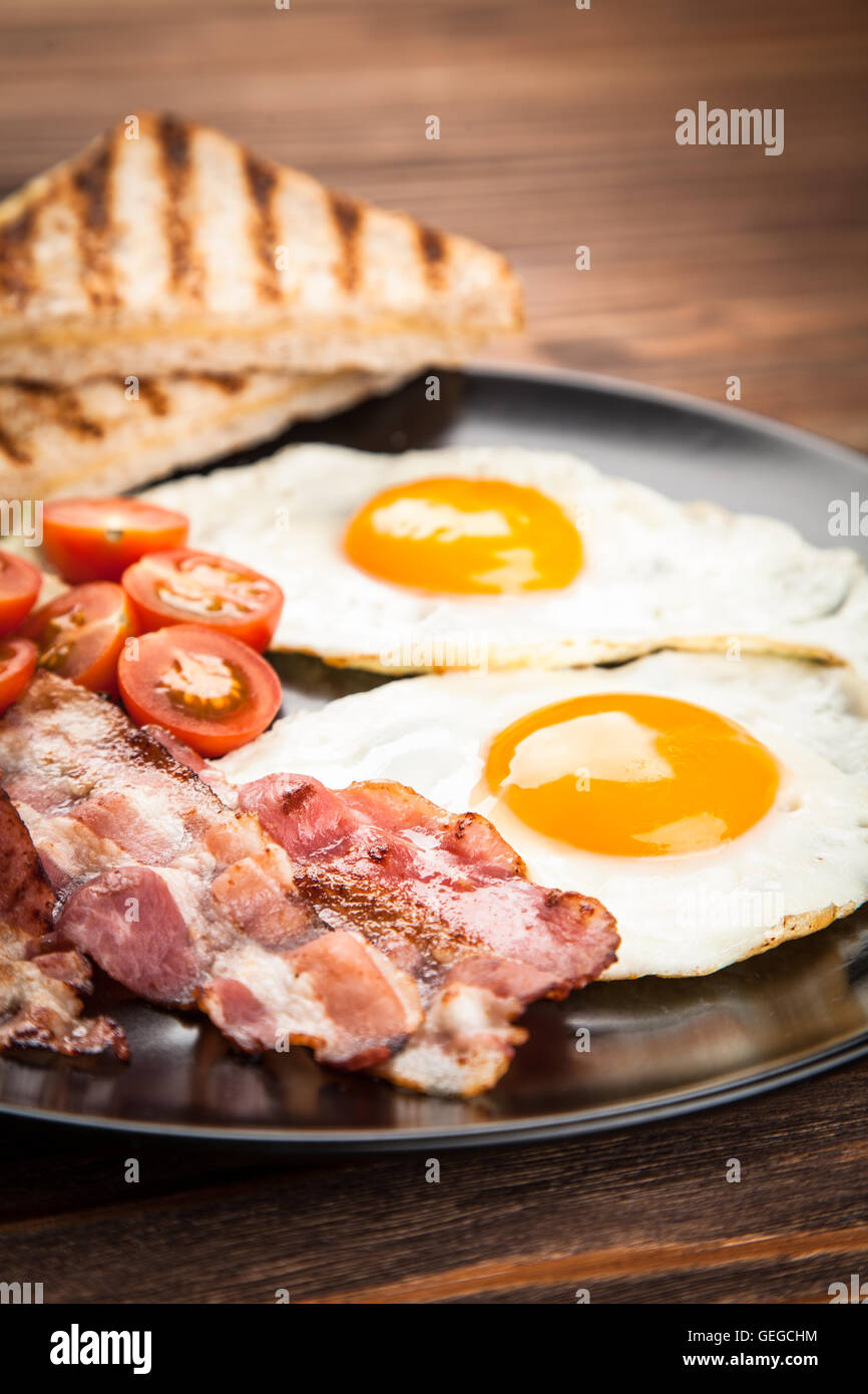 Traditional breakfast on a plate Stock Photo - Alamy
