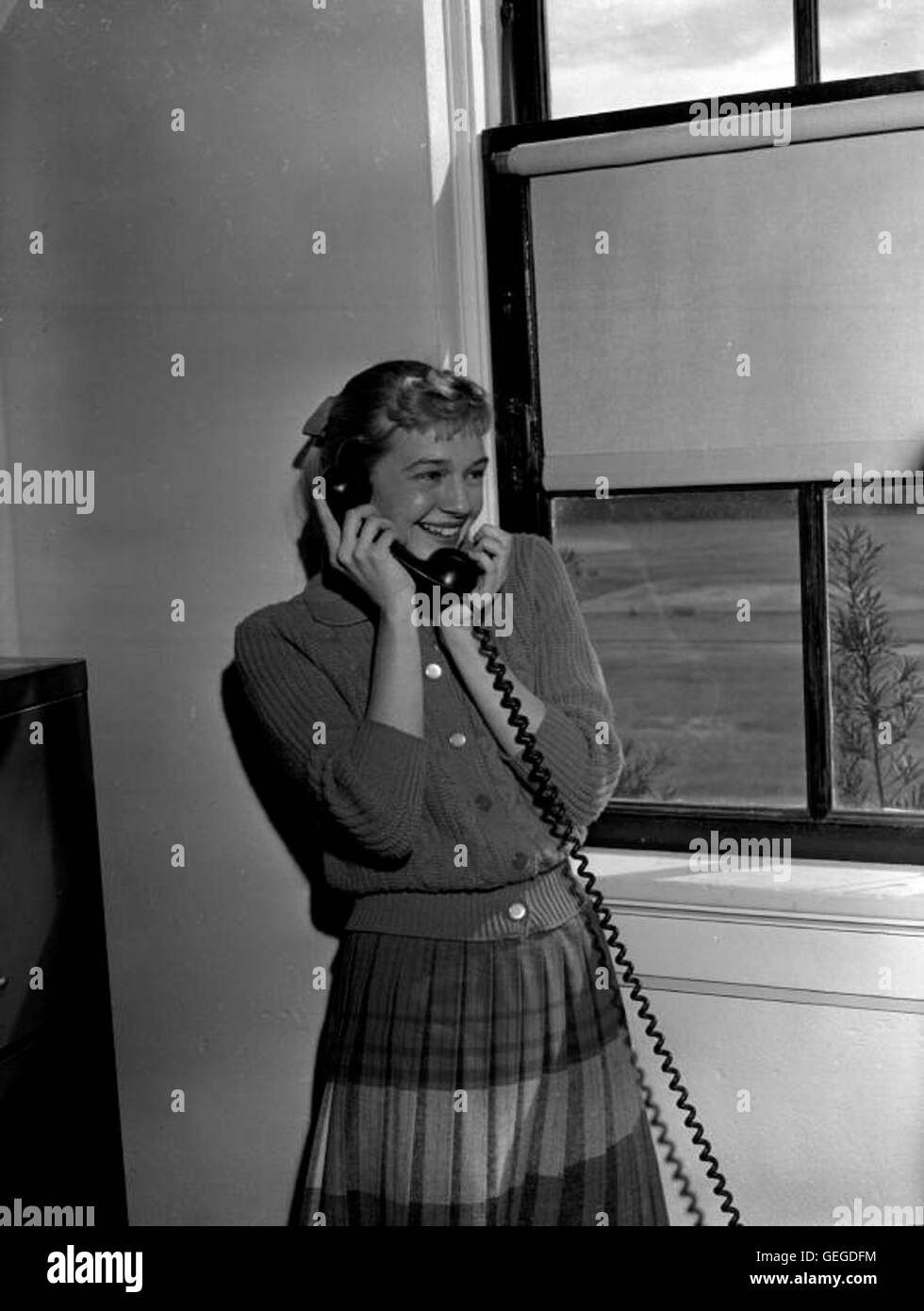 A photograph of Kay Lamb, upon learning she has been voted in May 1960 ...