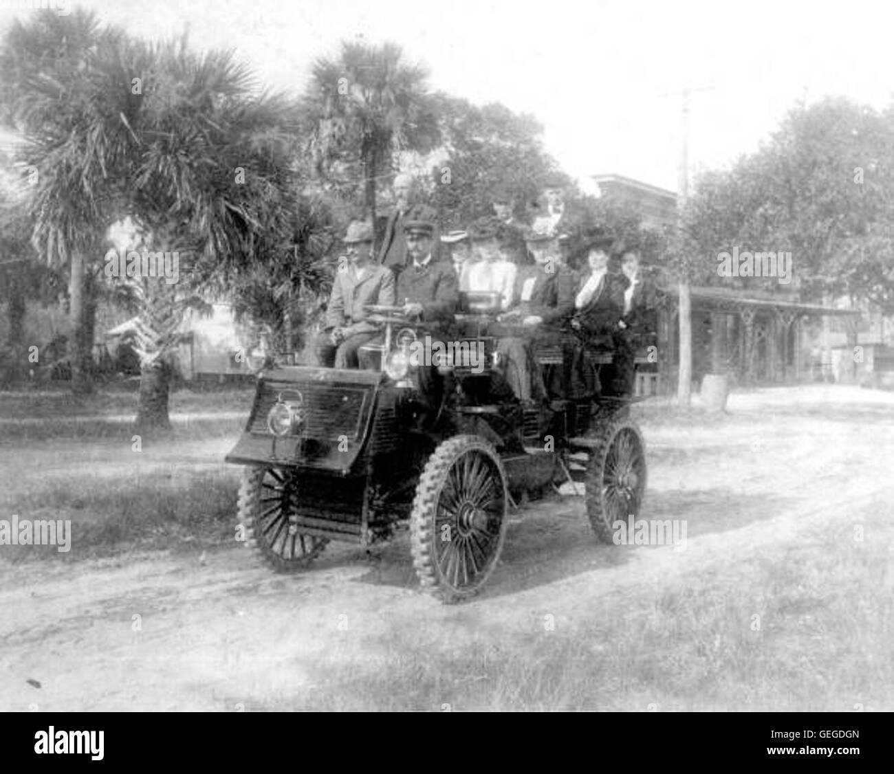 A vintage photo of people riding a motorized omnibus in Daytona Beach ...