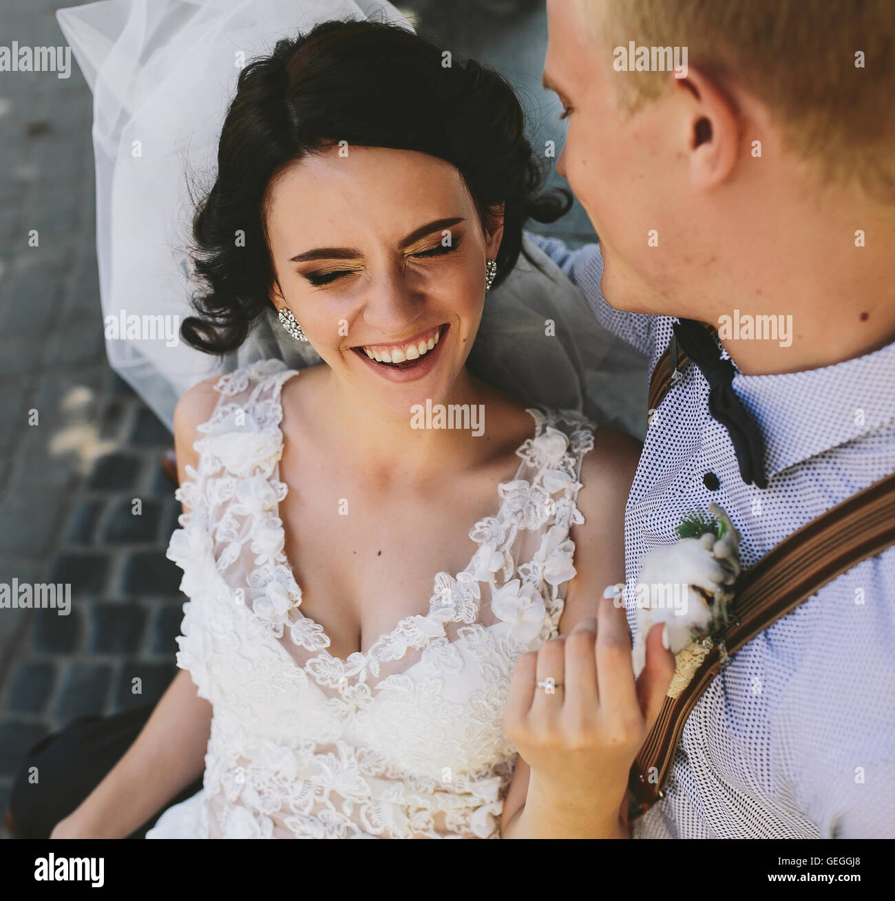 Bride and groom having fun Stock Photo - Alamy