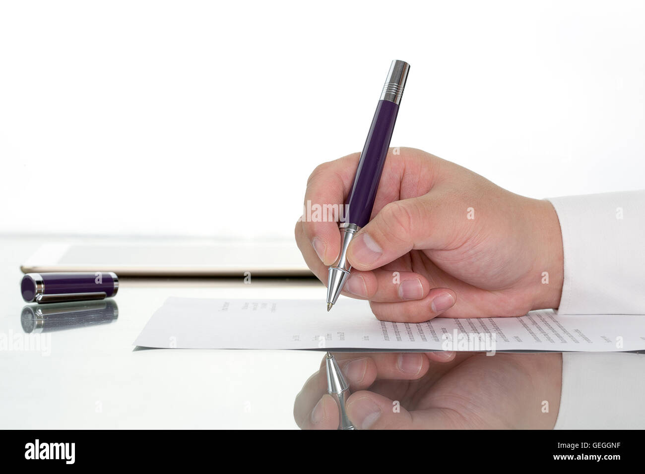 Hand with pen over application form, Businessman signing a contract ...