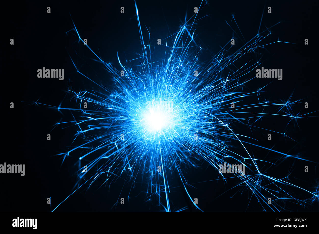 Blue burst of a sparkler in long exposure close up 3 Stock Photo - Alamy